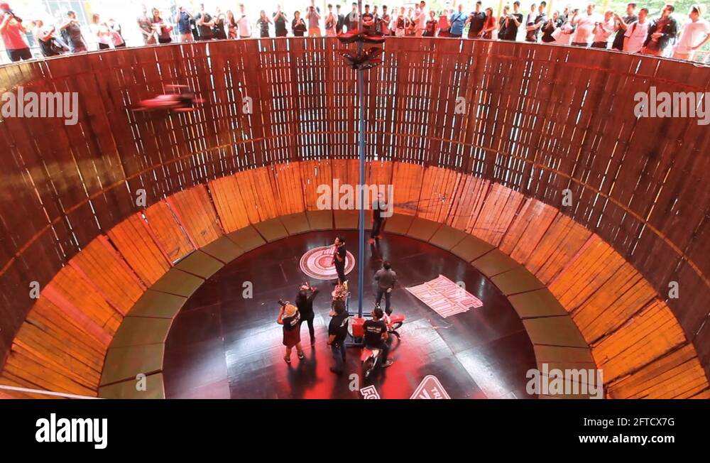 Rider performs a vertical circular track, known as the 'Wall of Death ...