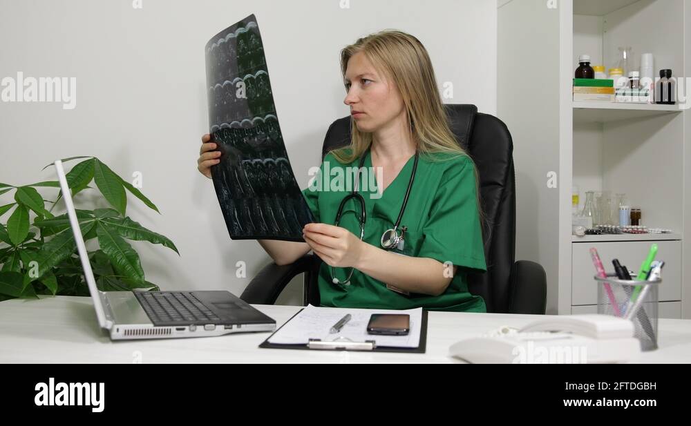 Doctor reviewing ct scan results Stock Videos & Footage - HD and 4K ...