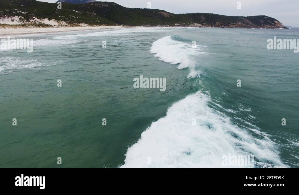 Wave crashing onto a beach Stock Videos & Footage - HD and 4K Video ...