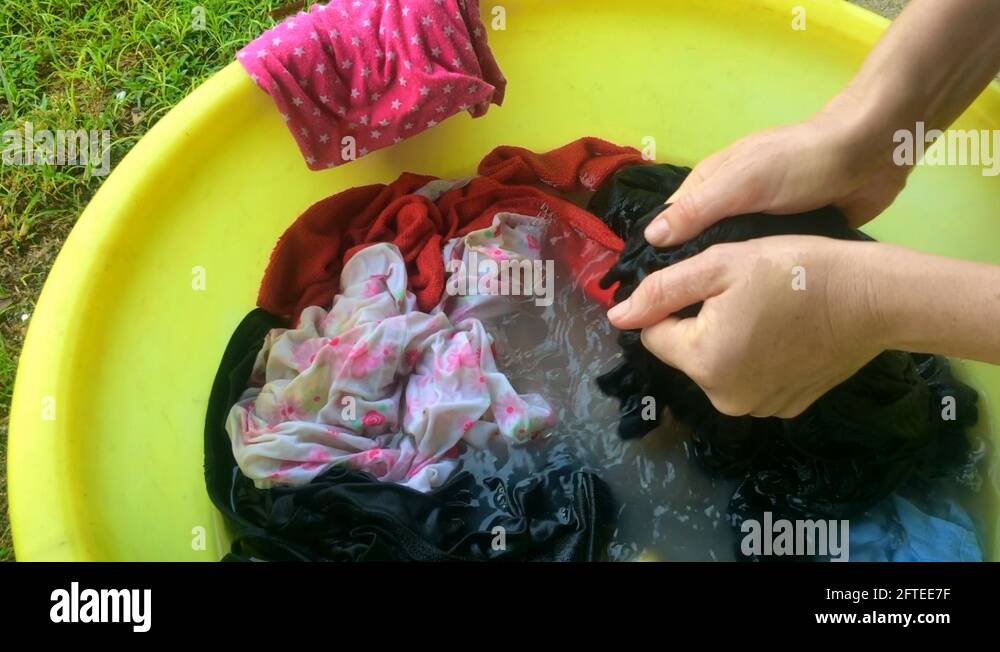 Woman hand washing clothes Stock Video Footage - Alamy