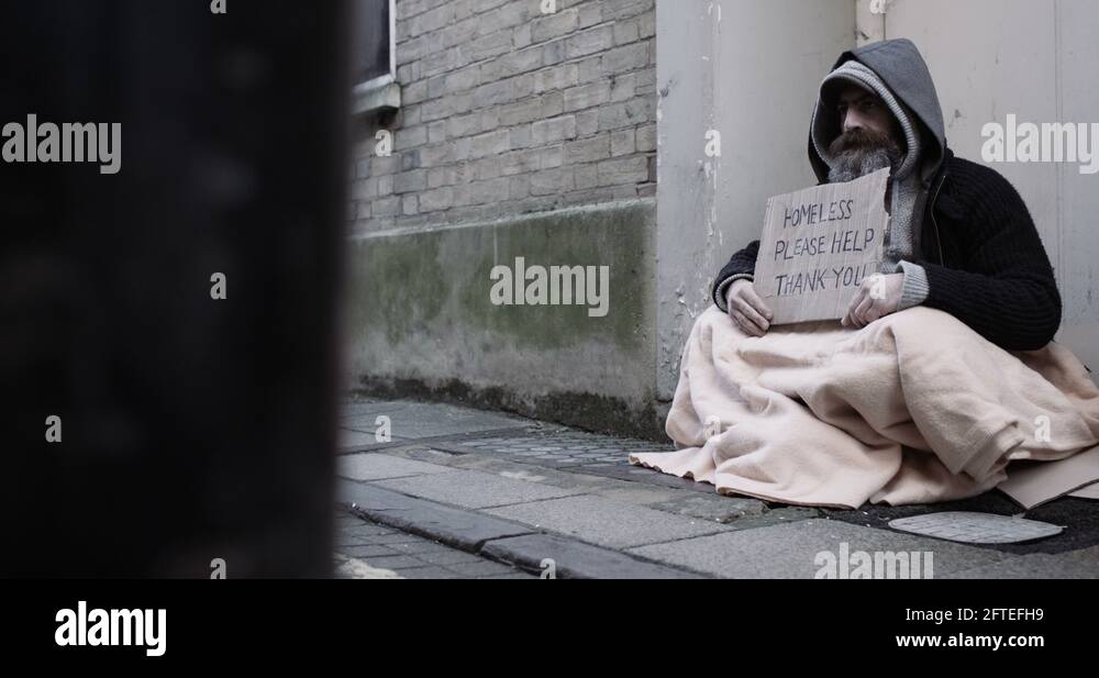 Homeless holding sign Stock Videos & Footage - HD and 4K Video Clips ...