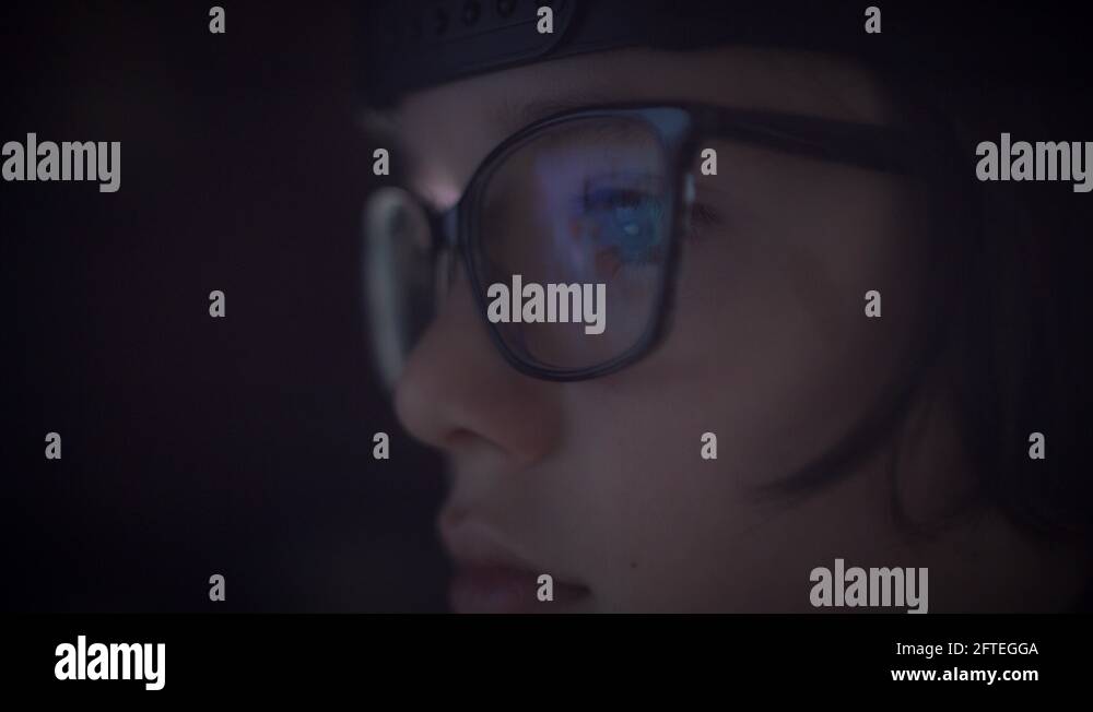 4K Close-up Computer Reflection in Glasses of a Child Eyes Stock Video ...