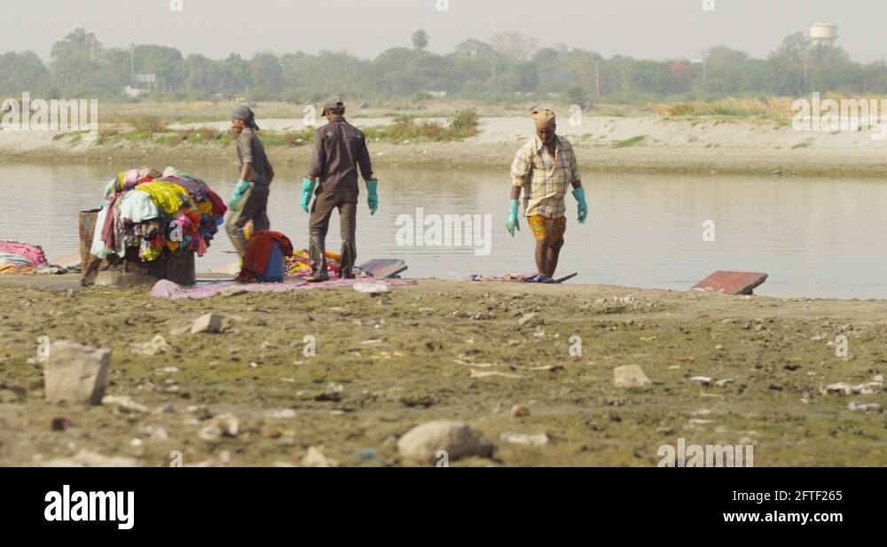 Dhobi Ghat (laundry by hand) using the Yamuna to wash traditional ...
