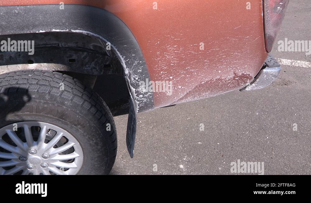 Road salt on vehicle causing rust and corrosion and paint damage Stock ...