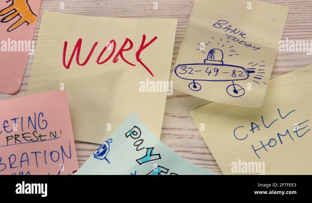 Office desk covered with post it papers - closeup, stop motion ...