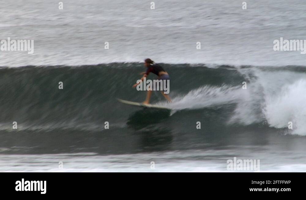 Wave curl surfer Stock Videos & Footage - HD and 4K Video Clips - Alamy