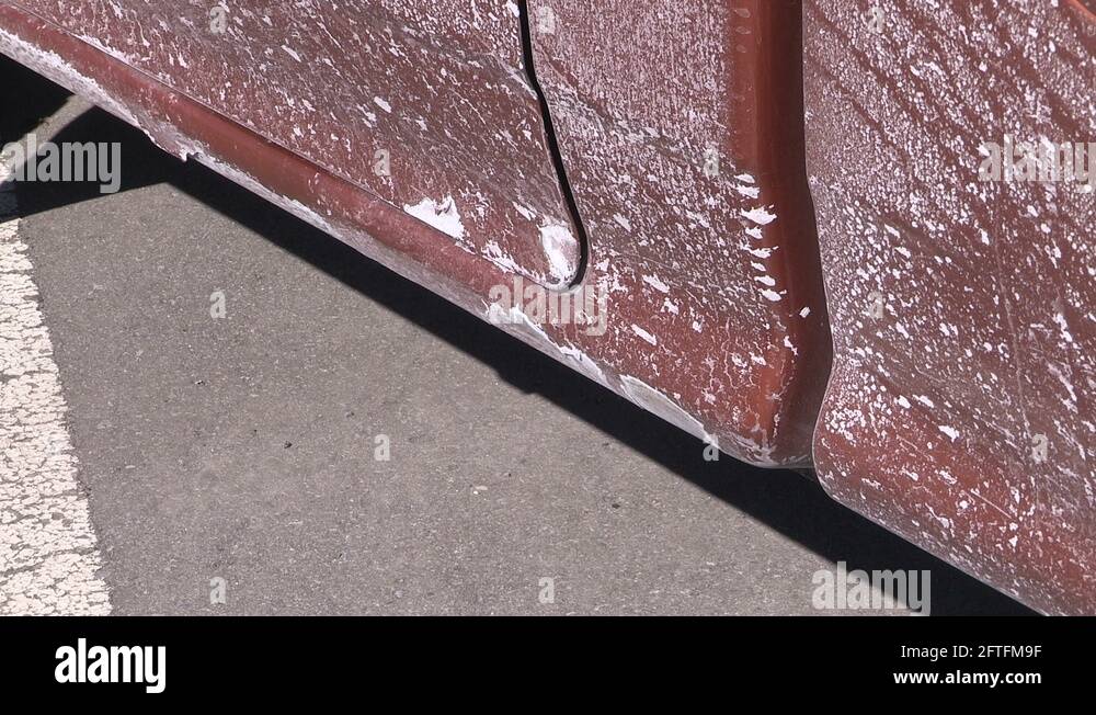 Road salt on vehicle causing rust and corrosion and paint damage Stock ...