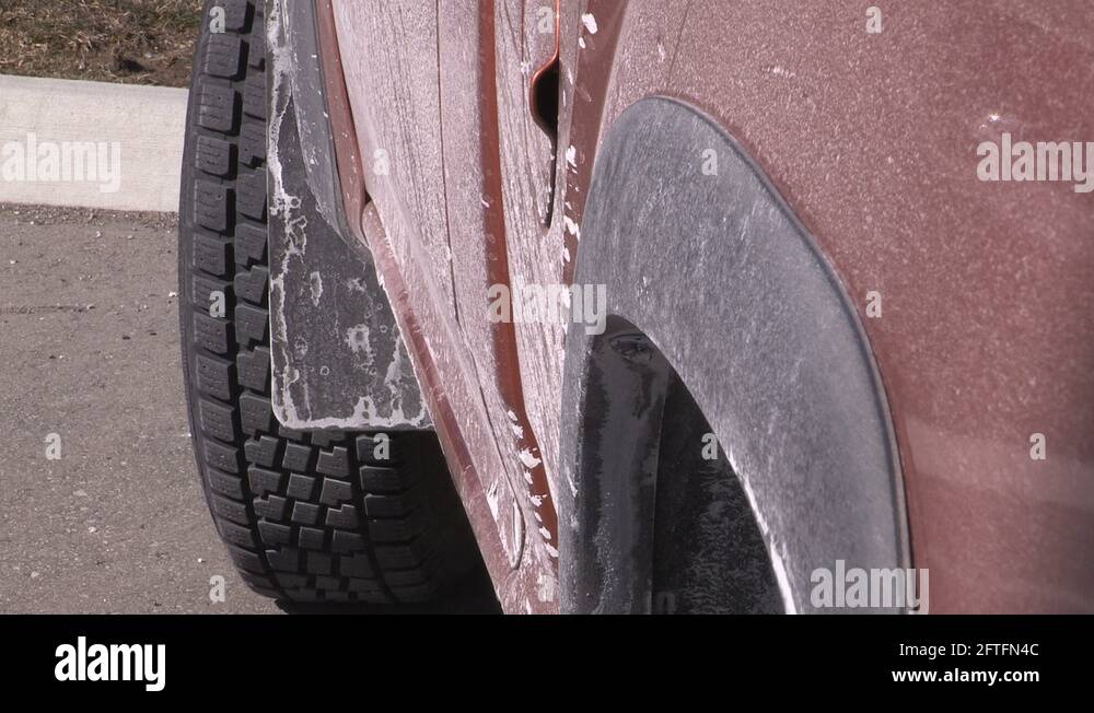 Road salt on vehicle causing rust and corrosion and paint damage Stock ...