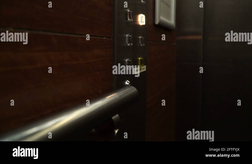 The button in the elevator lights up and goes out Stock Video Footage ...