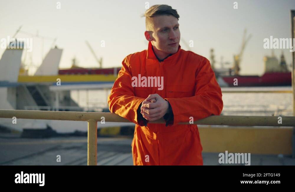 Man in orange uniform Stock Videos & Footage - HD and 4K Video Clips ...