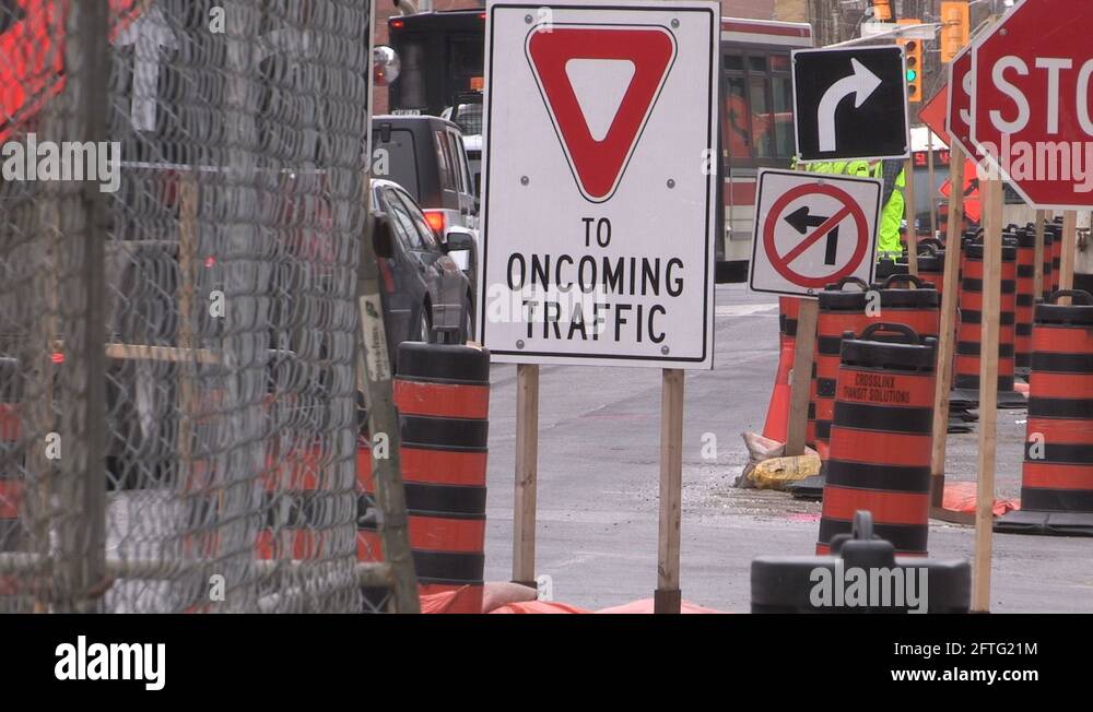 Road construction and traffic signs in downtown city streets Stock ...