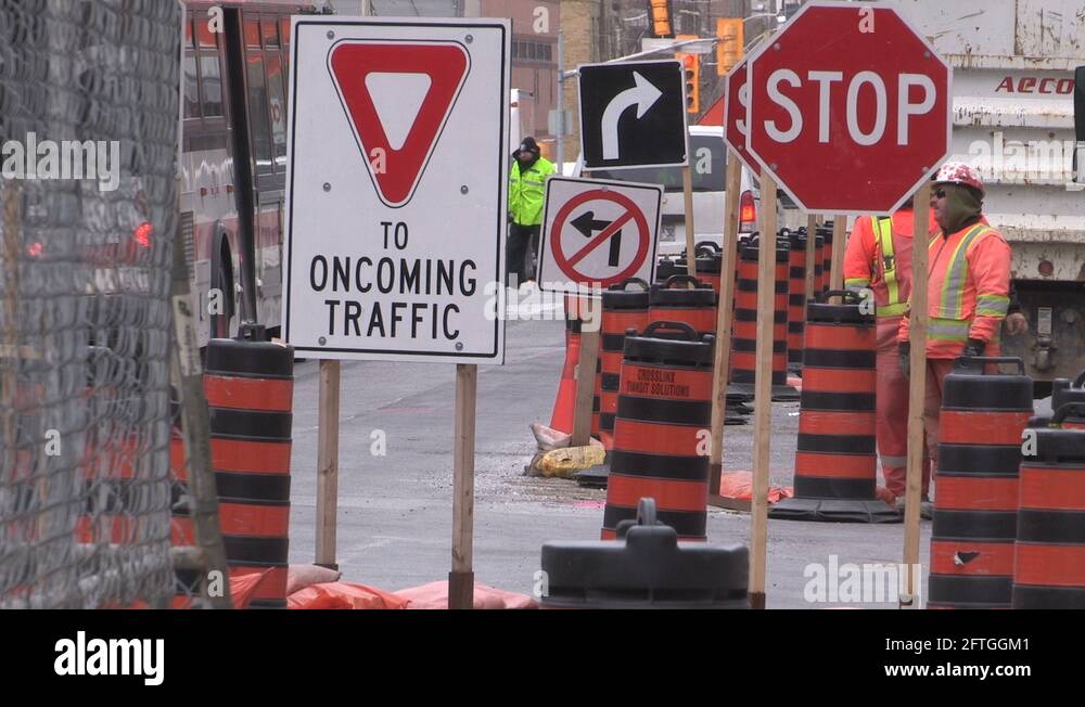 Road construction and traffic signs in downtown city streets Stock ...
