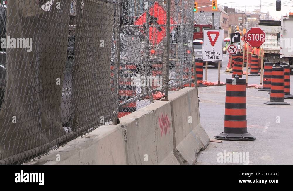 Road construction and traffic signs in downtown city streets Stock ...