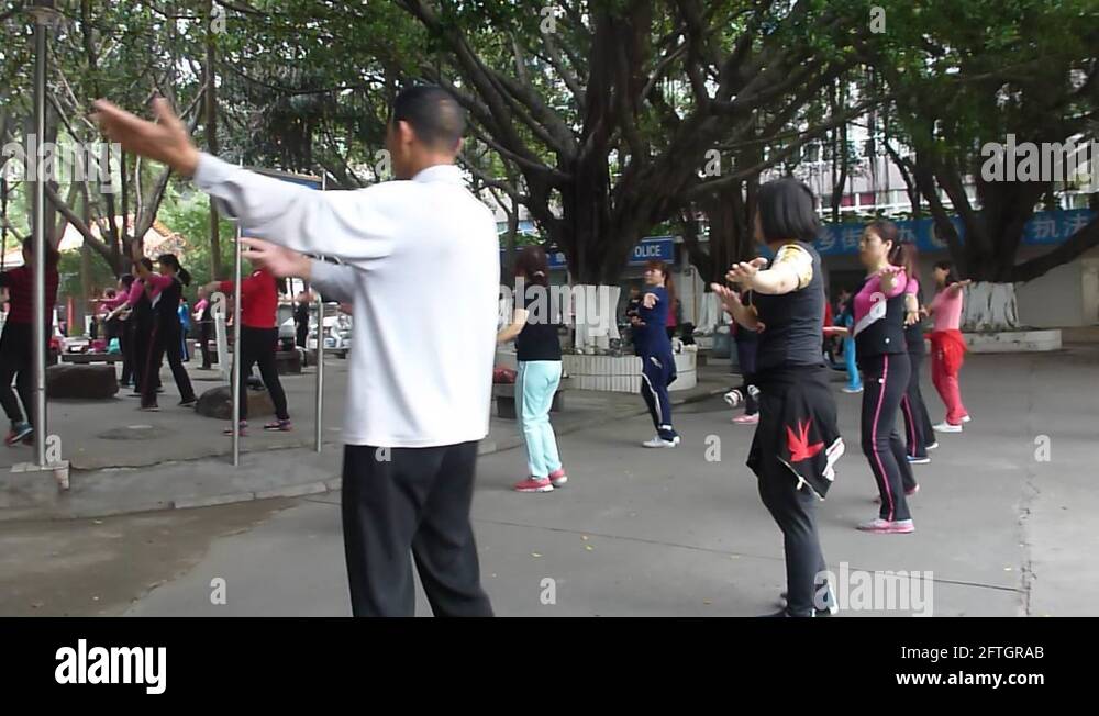 Chinese women dance in the morning as a fitness exercise Stock Video ...
