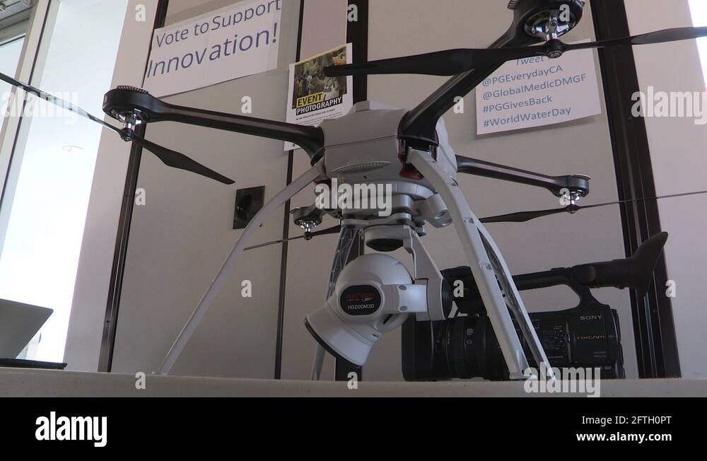 Camera equipped UAV drone on display Stock Video Footage - Alamy
