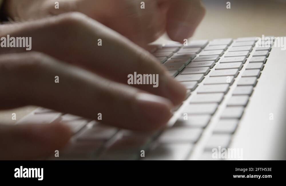 HYPERLAPSE: Detail of two-handed 10 fingers touch typing on keyboard at ...