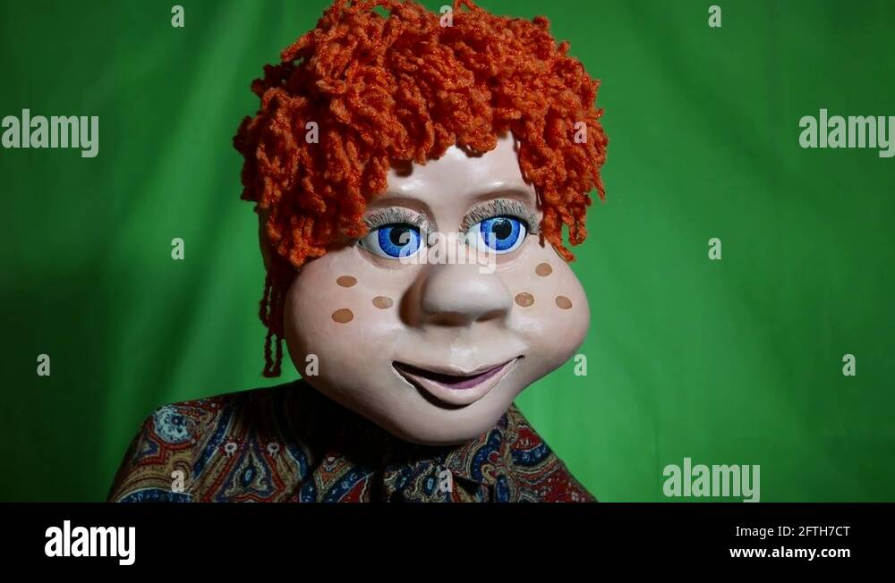 The puppet guy is a TV presenter with red hair. P1040027 Stock Video ...