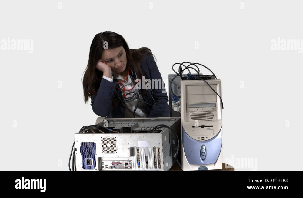 Frustrated woman trying to repair computer system unit. Alpha channel ...