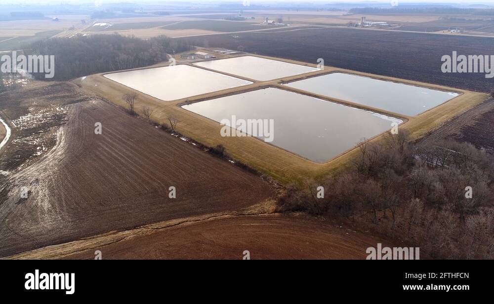 Rural fish farm, hatchery with four ponds, windowpane configuration ...