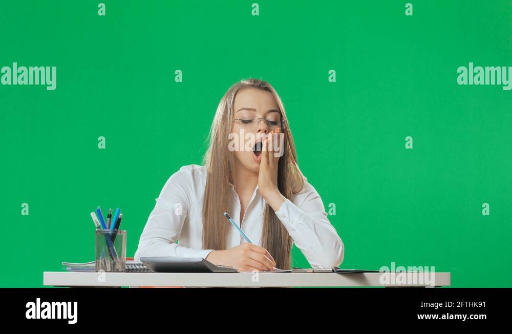Girl secretary falls asleep at work, green screen, alpha Stock Video ...