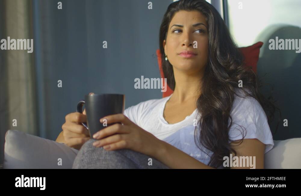 Head and Shoulder shot at a 45 degree angle of a woman sitting on the ...