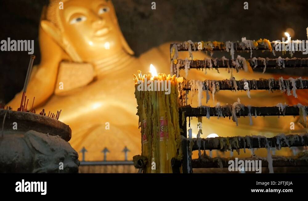 Buddhism candle cave Stock Videos & Footage - HD and 4K Video Clips - Alamy