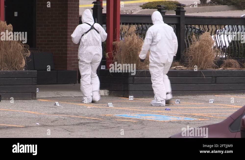 Police officers at crime scene of wild Toronto area nightclub shooting ...