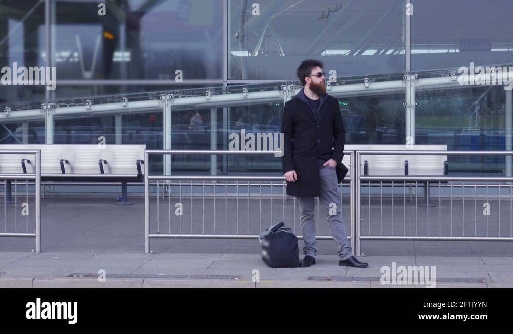 Man outside airport Stock Videos & Footage - HD and 4K Video Clips - Alamy