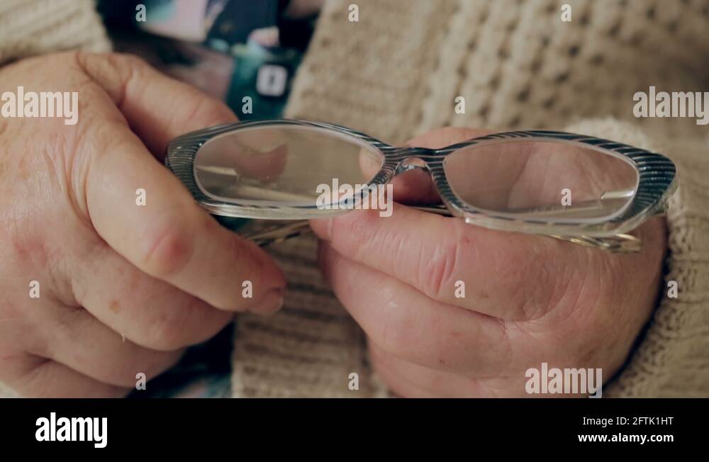 Old lady holding glasses Stock Videos & Footage - HD and 4K Video Clips ...