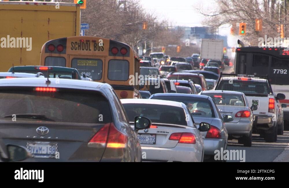 Heavy rush hour traffic jam and gridlock in city streets and ...