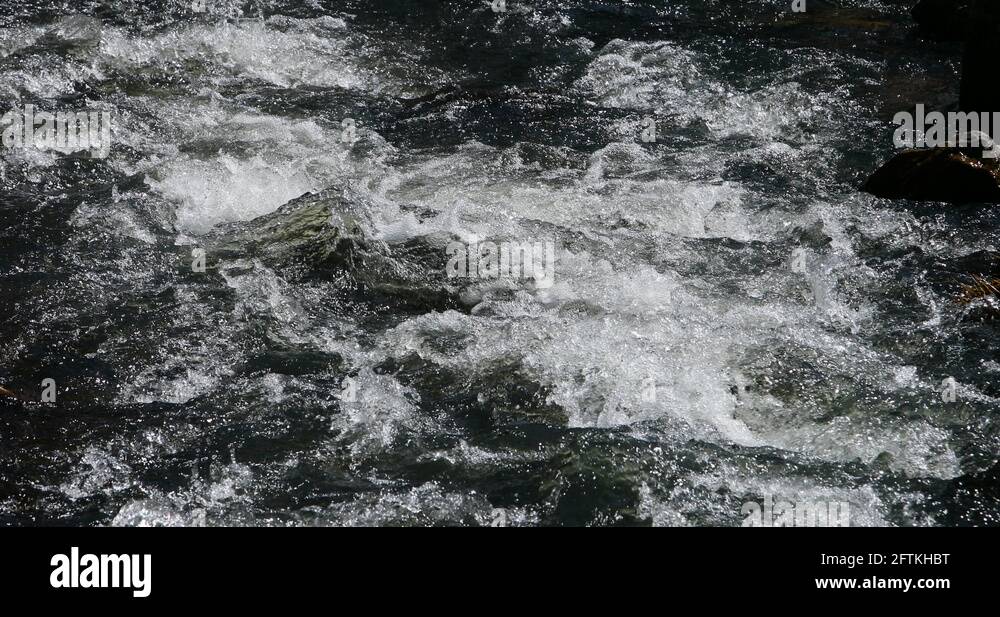 Mountain river ripples reflection moving water slow motion 4K Stock ...