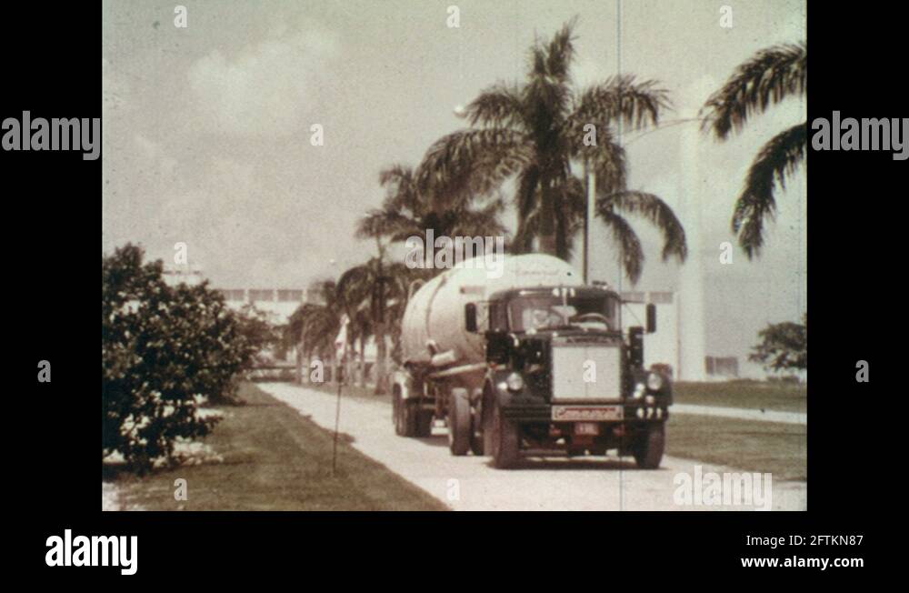 1960s: Cement truck driving from factory / Interior of cement plant ...