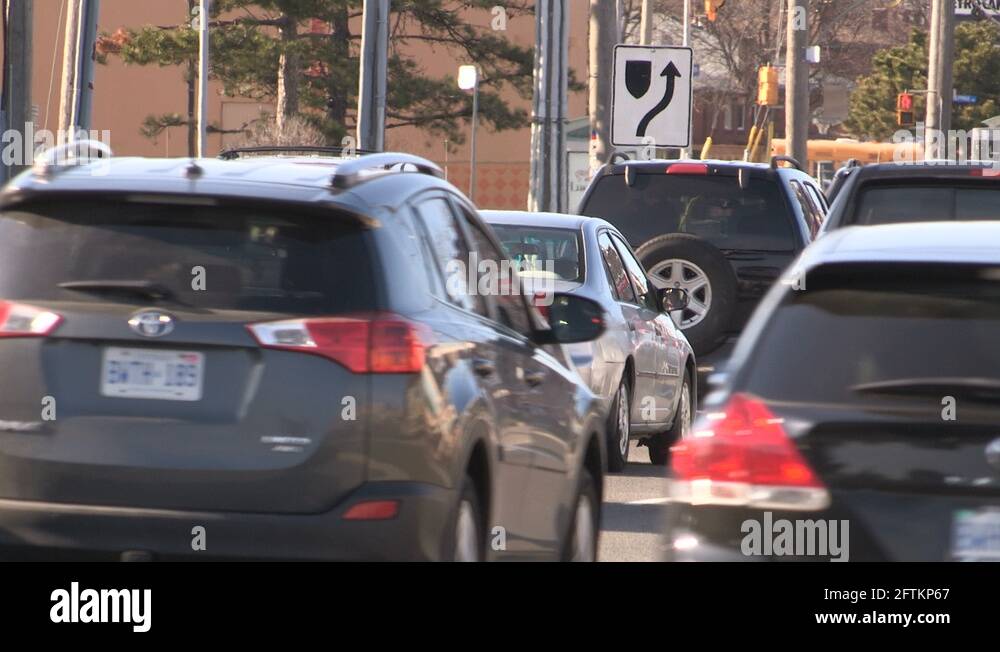 Heavy rush hour traffic jam and gridlock in city streets and ...