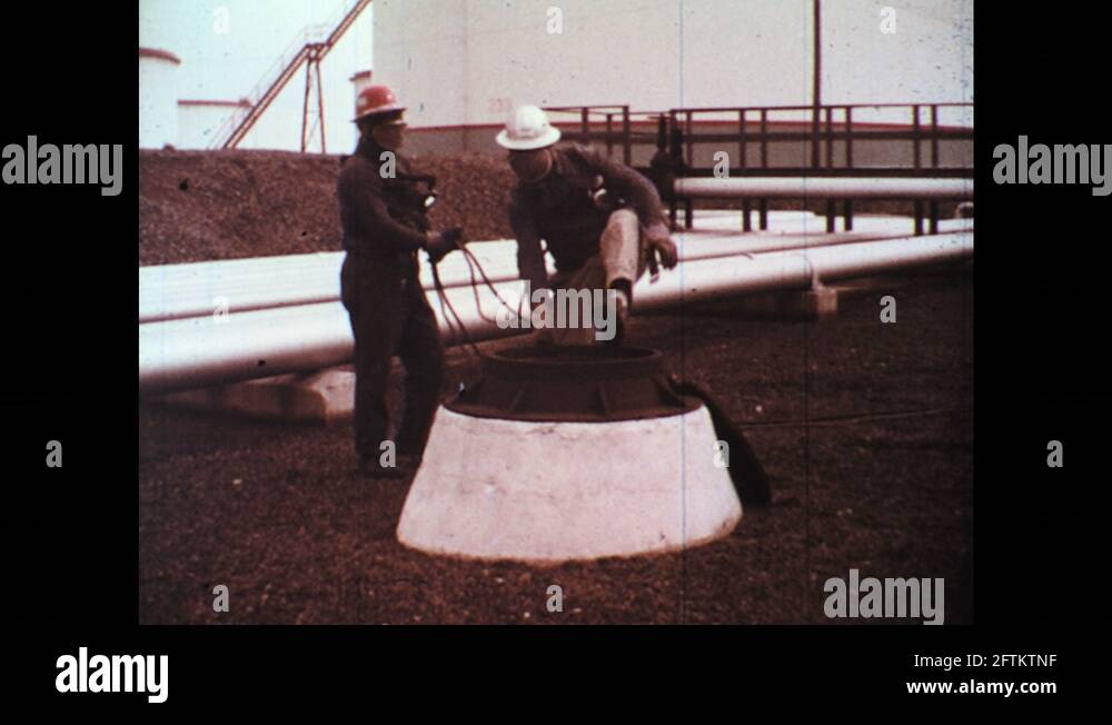 1970s: Worker At Risk of Hydrogen Sulfide Poisoning as He Inspects ...