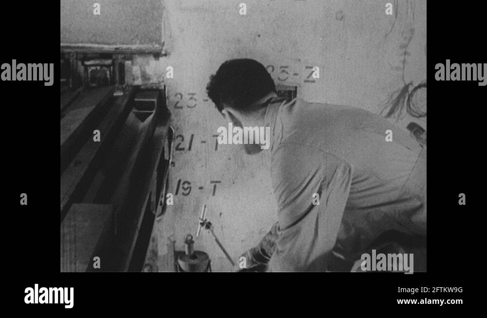 1940s-1950s : A scientist drops canister of radioactive material into a ...
