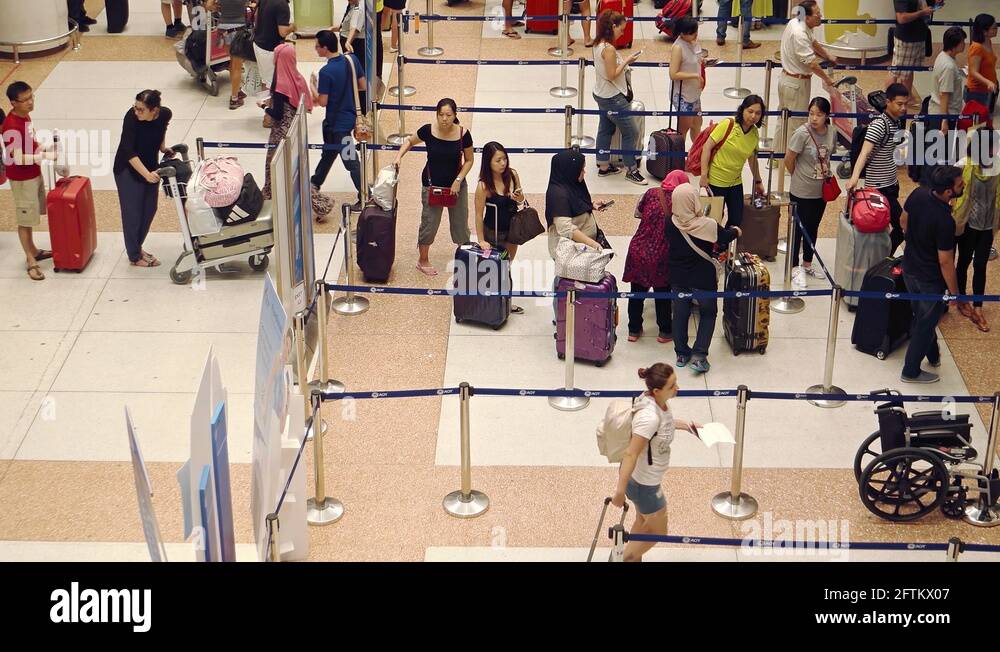 Long lines at ticketing counters at Phuket International Airport in ...
