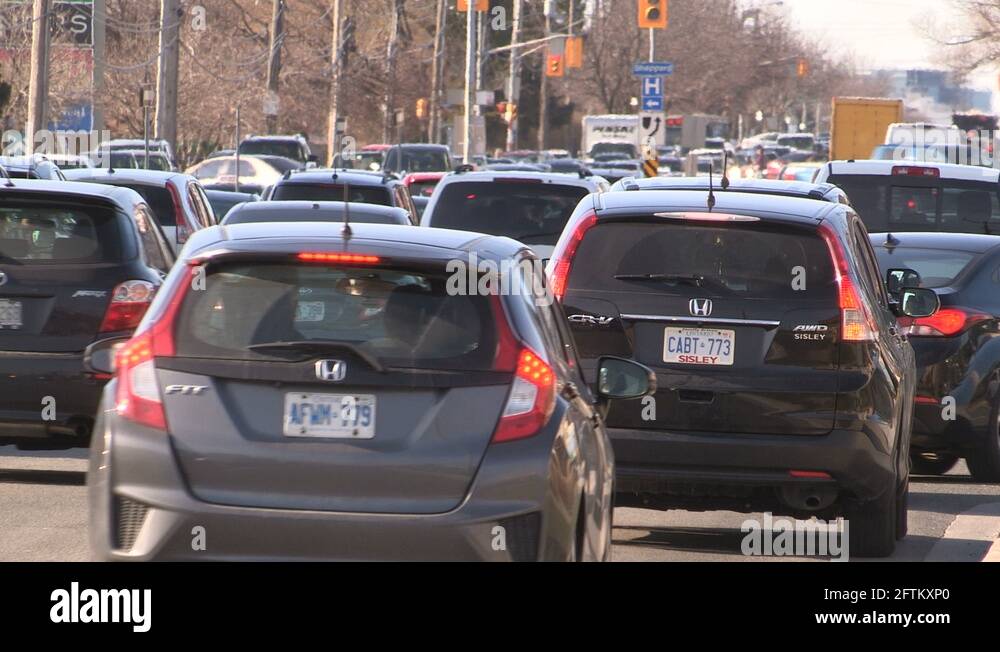 Heavy rush hour traffic jam and gridlock in city streets and ...