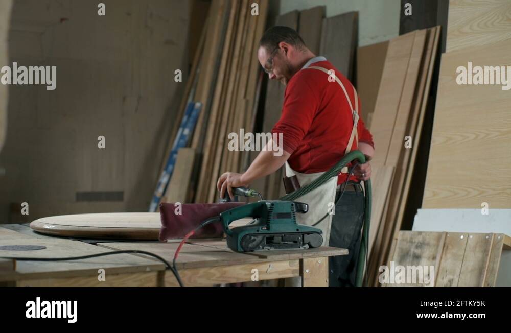 Carpenter polishing round plank electric Stock Videos & Footage - HD ...