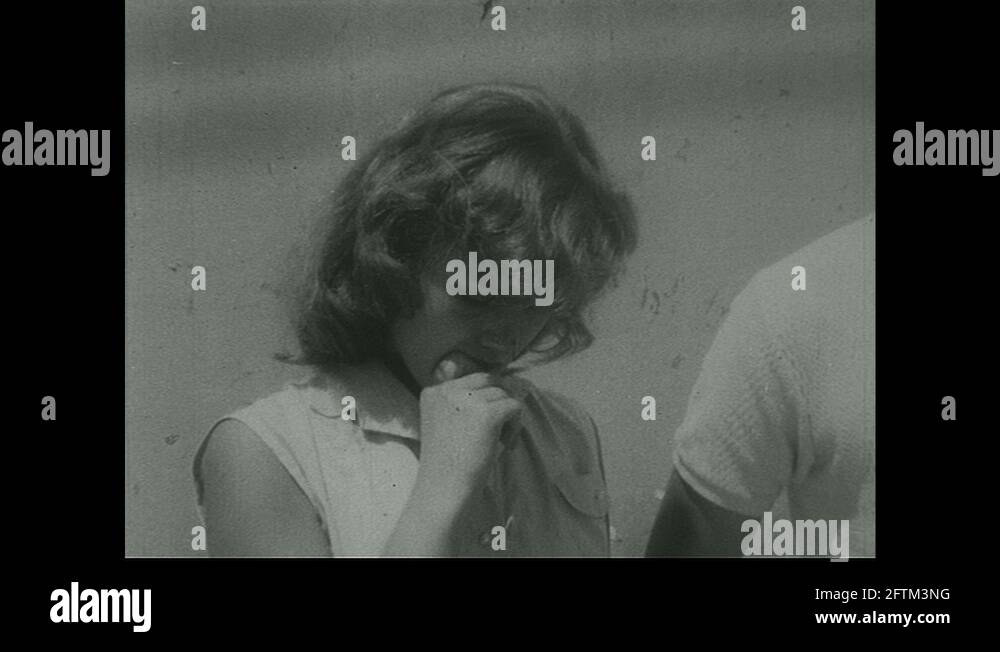 1950s – Three teenagers look depressed after being arrested by a police ...