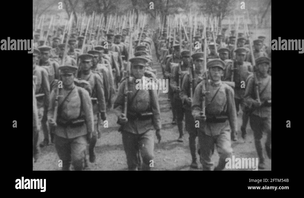 1940s: Views of Japanese soldiers marching / Soldiers on hill / Line of ...