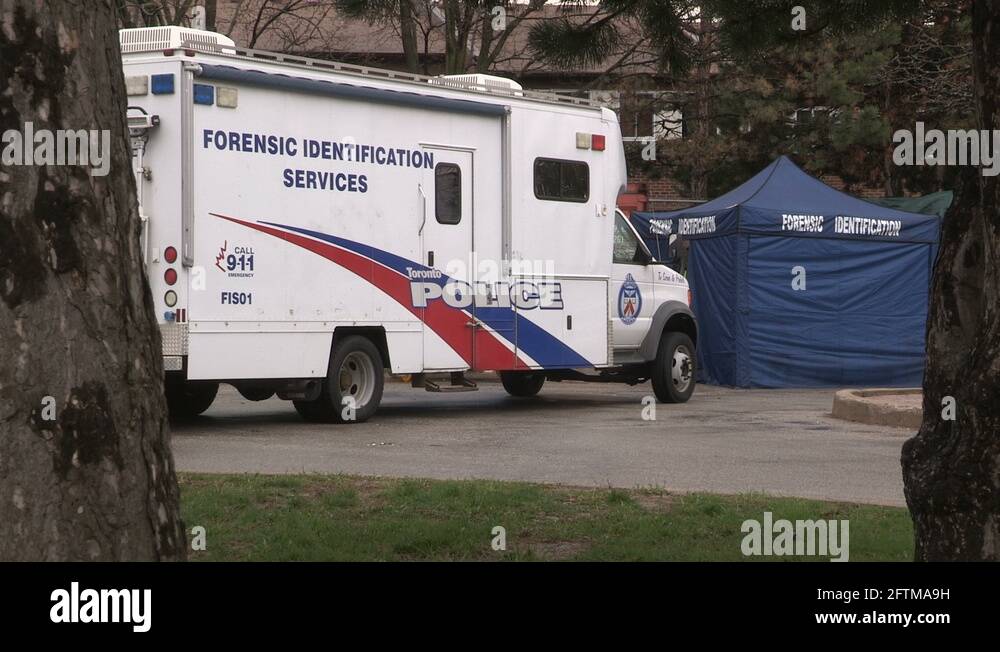 Police at shooting homicide crime scene in housing project in city ...