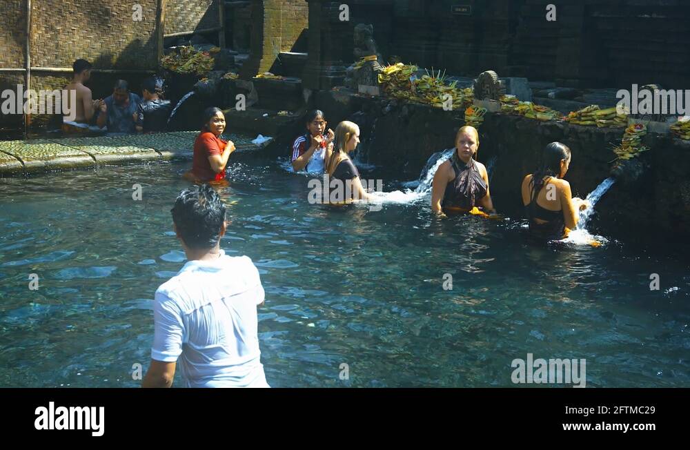 Women take bath at Holy Spring Water Tirta Empul Hindu Temple. Bali ...