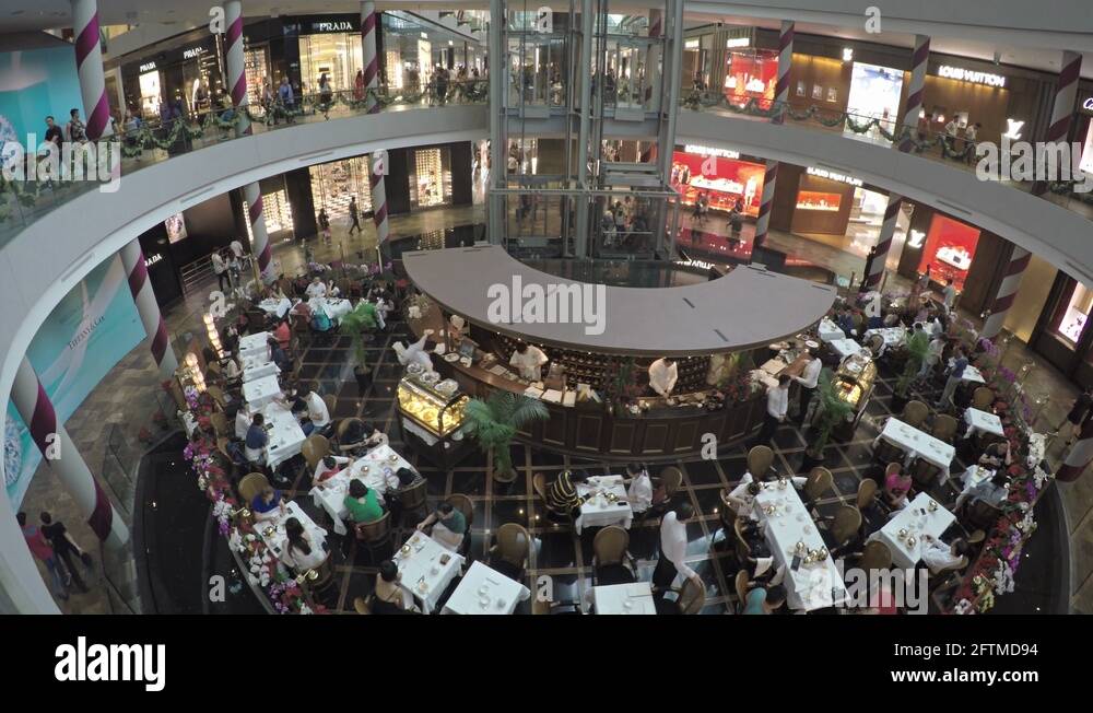Luxury Dining in an Atrium Restaurant at the Mall inside Marina Bay ...
