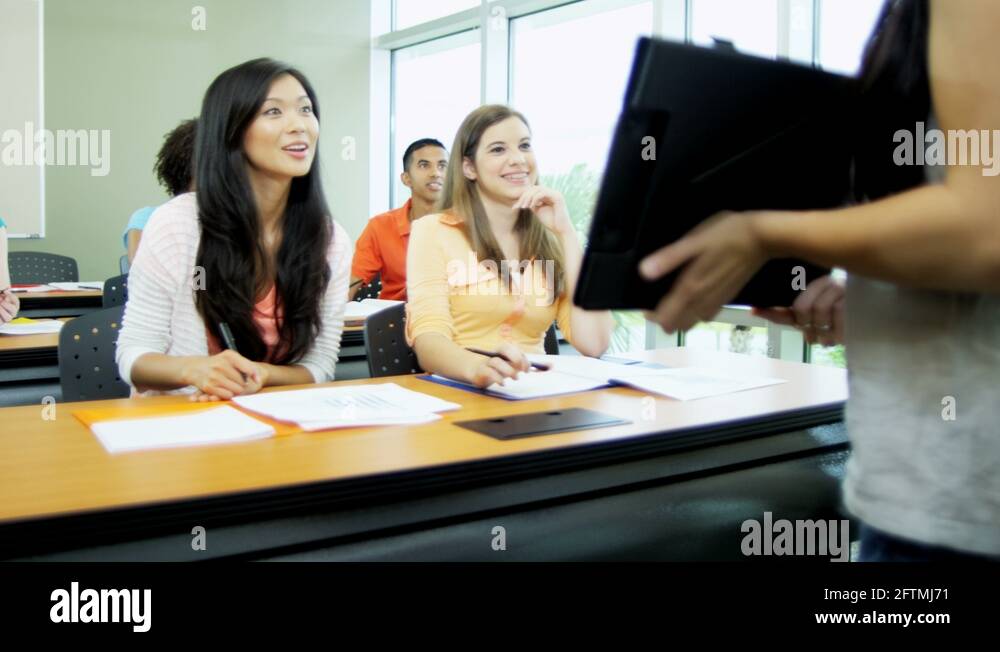 Teenage students in classroom Stock Videos & Footage - HD and 4K Video ...