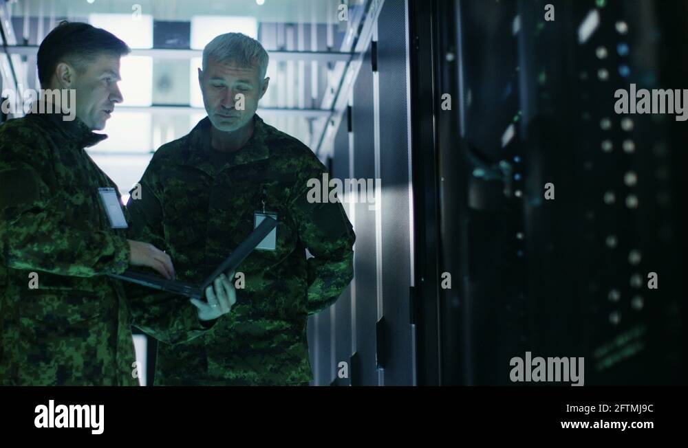 In Data Center Two Military Men Work with Open Server Rack Cabinet ...