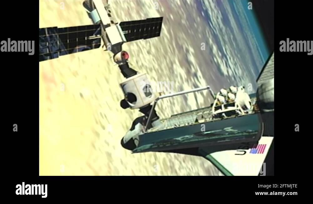 1990s: CGI animation shows robotic arm attach hardware to int'l space ...
