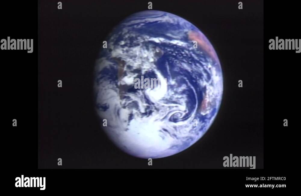 1990s: View of Earth turning / Animated view of landscape, sky Stock ...