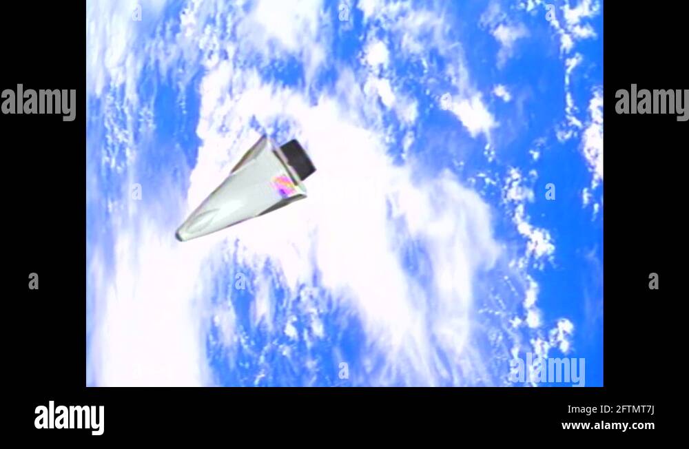 1990s: A space shuttle descends towards earth. A space shuttle is ...