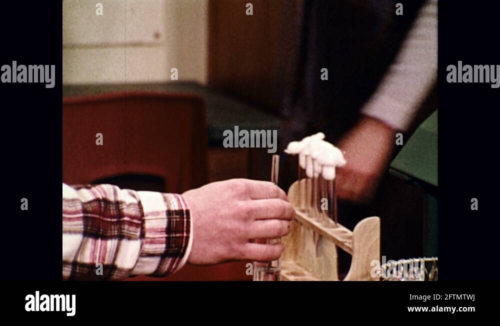 Adding a Rubber Pipetting Ball to Pipettes Stock Video Footage - Alamy