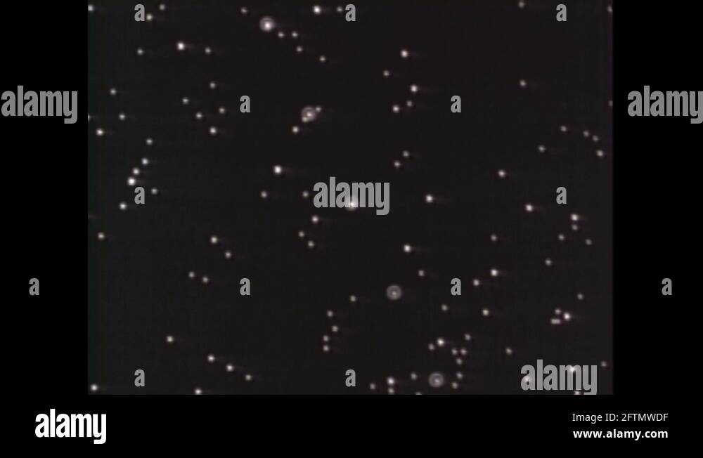 1990s: View of stars / Moon / Surface of moon / Zoom in on moon surface ...
